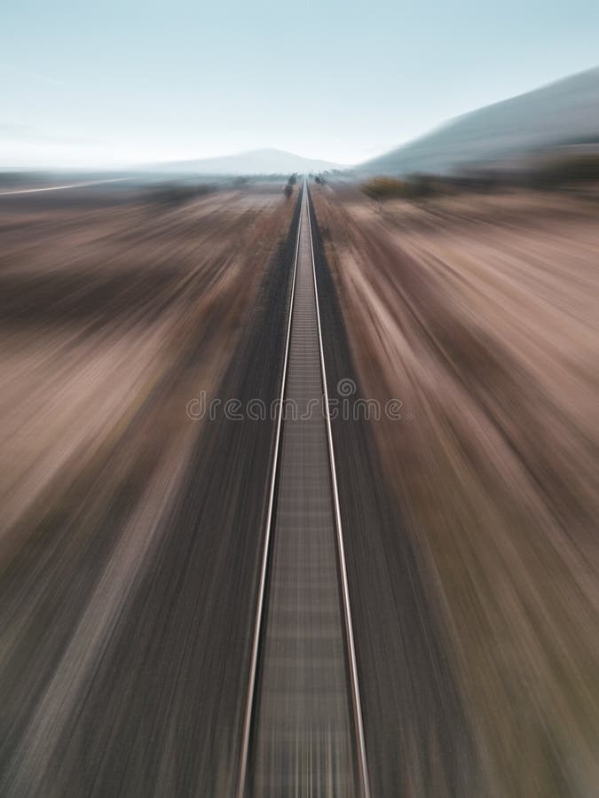 Motion Blur View Taken by Drone of Train Track Passing through Arid ...