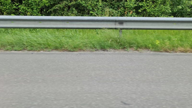 Motion Blurred View Out of the Side Window of a Driving Car on a ...