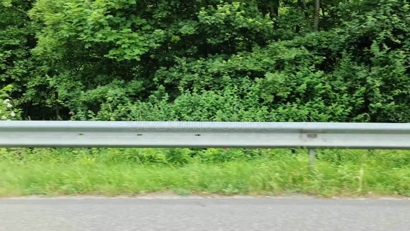 Motion Blurred View Out of the Side Window of a Driving Car on a ...
