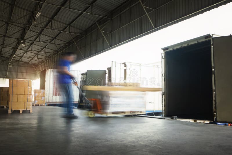 Motion Blurred of Workers Unloading Cargo Boxes Pallet into Container ...