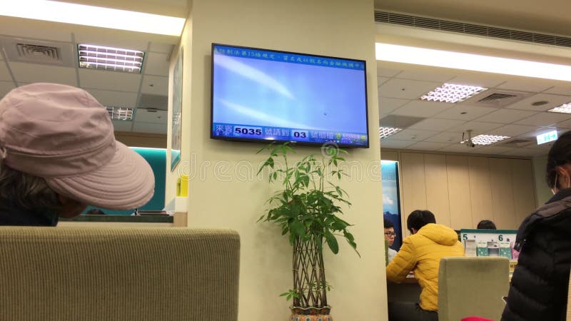 Motion of Customers Sitting and Waiting for Service Inside Bank Stock ...