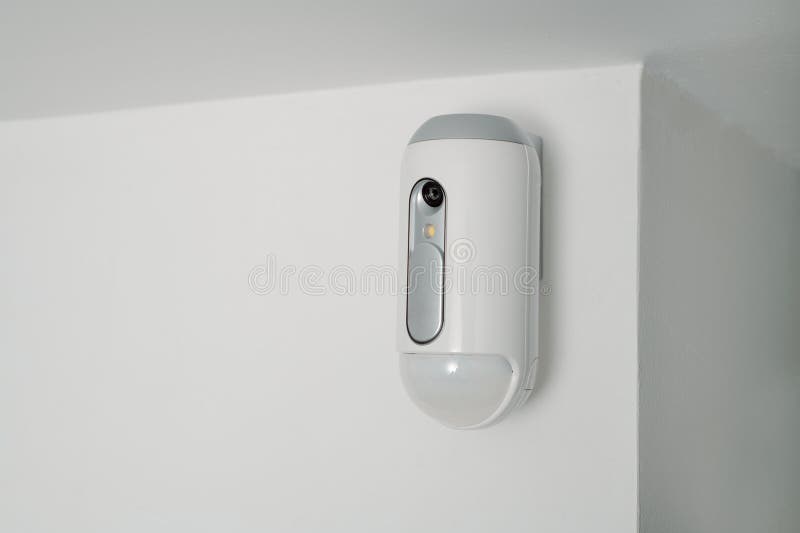 Motion Detector with a Camera on a Wall Indoors Stock Photo - Image of ...