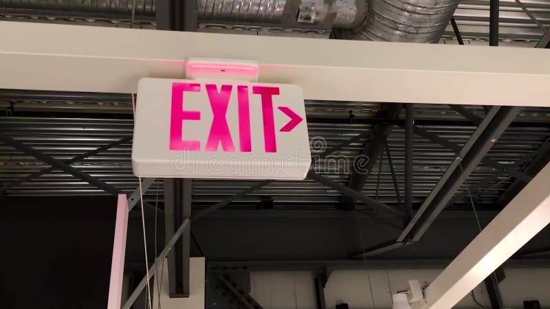 Motion of Emergency Exit Sign on Ceiling Inside Shopping Mall Stock ...