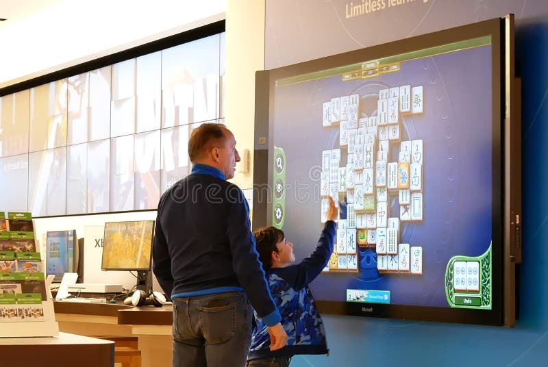 Motion of Father and Children Playing Xbox Game on Tv Screen Editorial ...