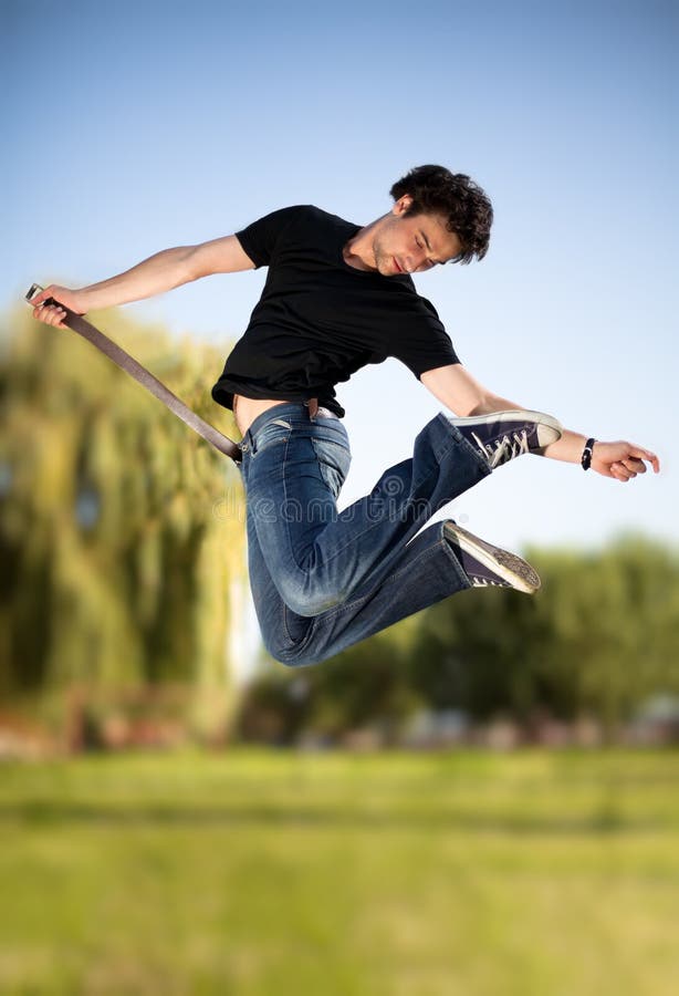 Attractive Young Male Model Jumping Outdoors Stock Photo - Image of ...