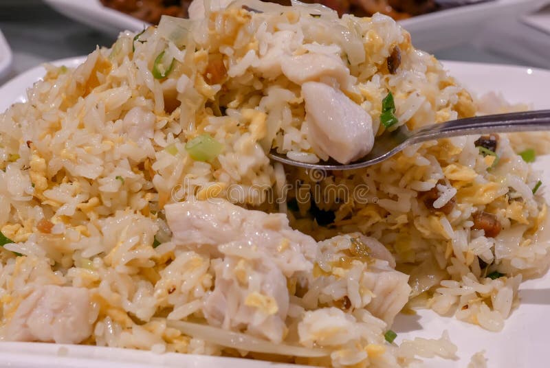 Motion of People Eating Fried Rice on Table Inside Restaurant Stock ...