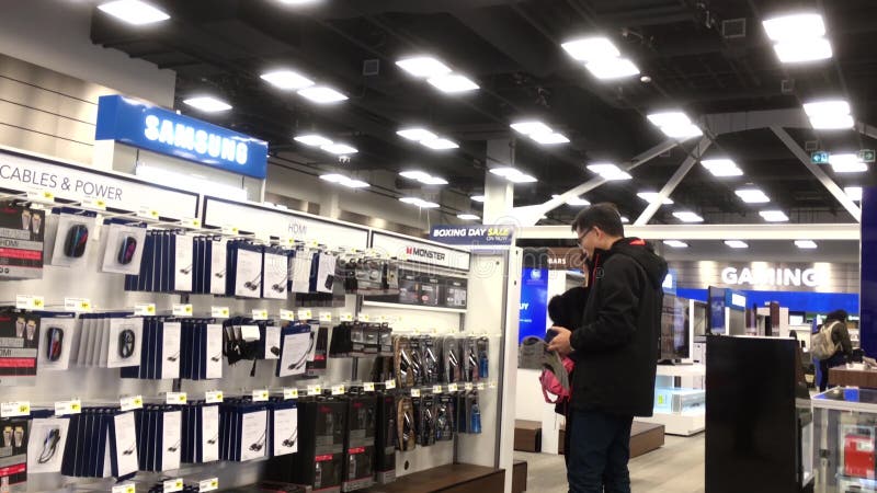Motion of People Looking for Hdmi Cable Inside Electronic Store Stock ...