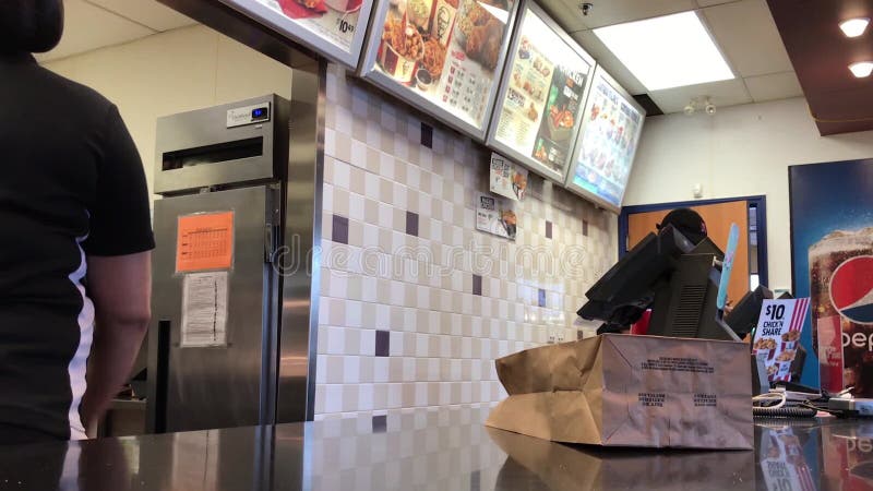 Motion of People Ordering Chicken Inside KFC Restaurant Stock Video ...