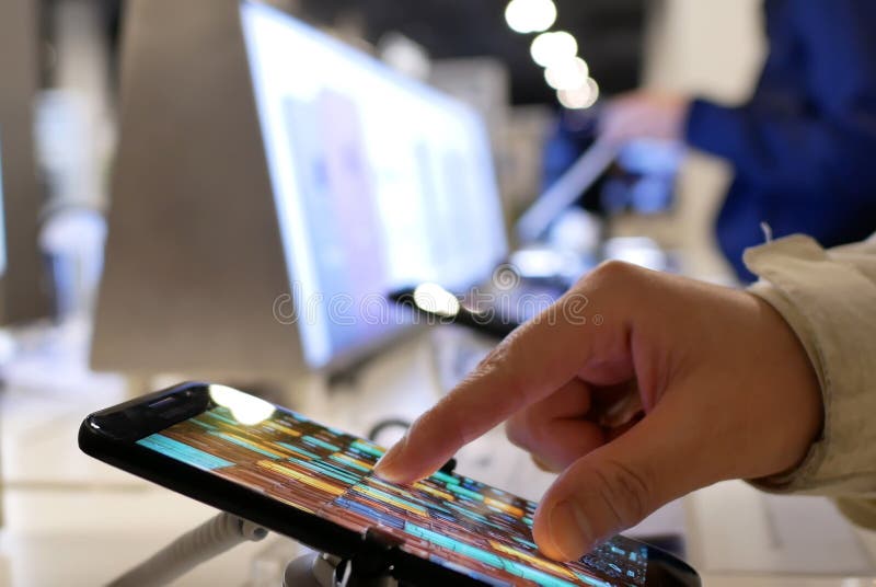 Motion of People Playing on Samsung Galaxy S8 Cellphone Inside ...