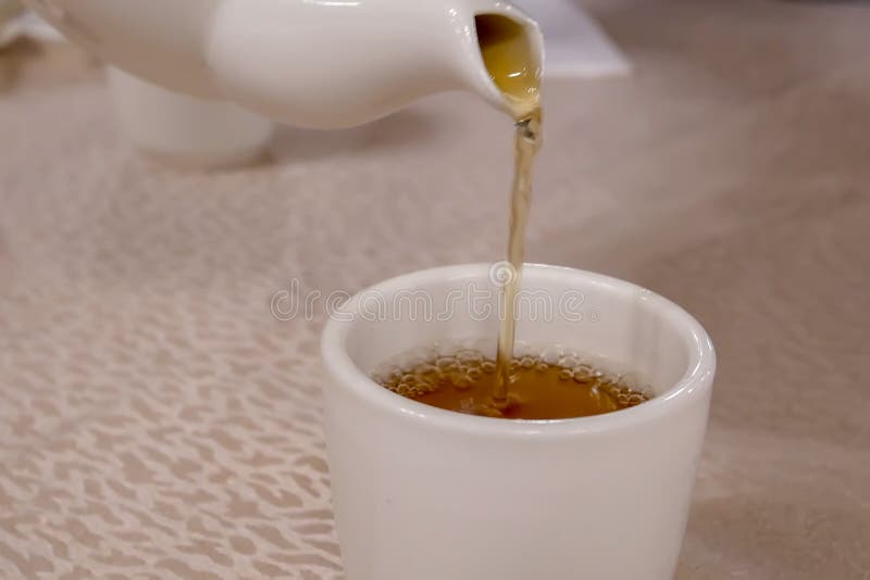 Motion of People Pouring Hot Tea Inside Chinese Restaurant Stock Image ...