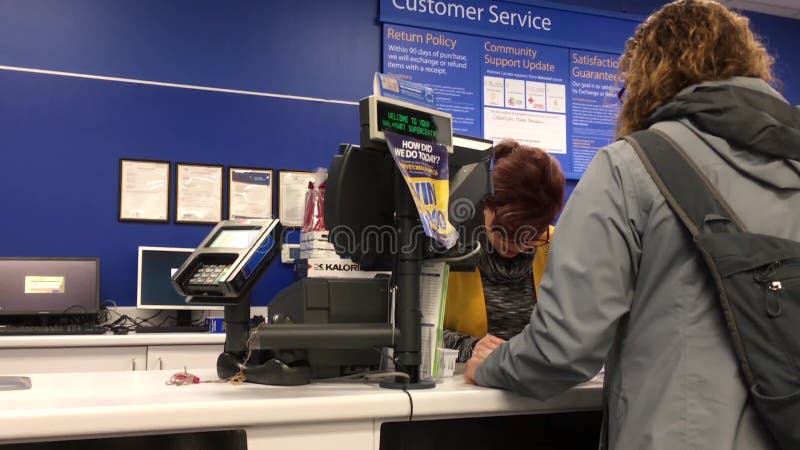 Motion of People Returning Items at Customer Service Counter Stock ...