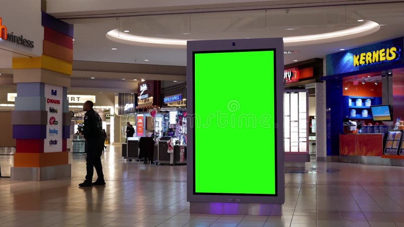 Motion of People Shopping and Green Screen Billboard in the Middle ...