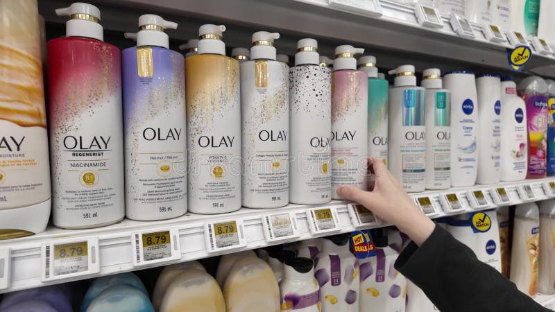 Motion of People Taking Olay Shampoo and Conditioner Inside Superstore ...