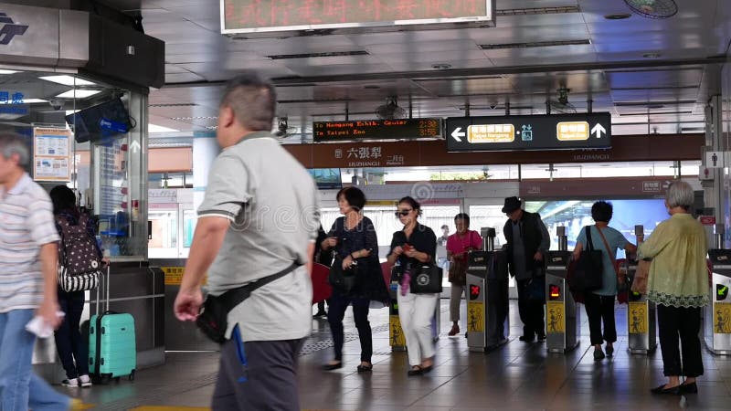 Video: Motion of people walking through the fare pay zone and tapping ...