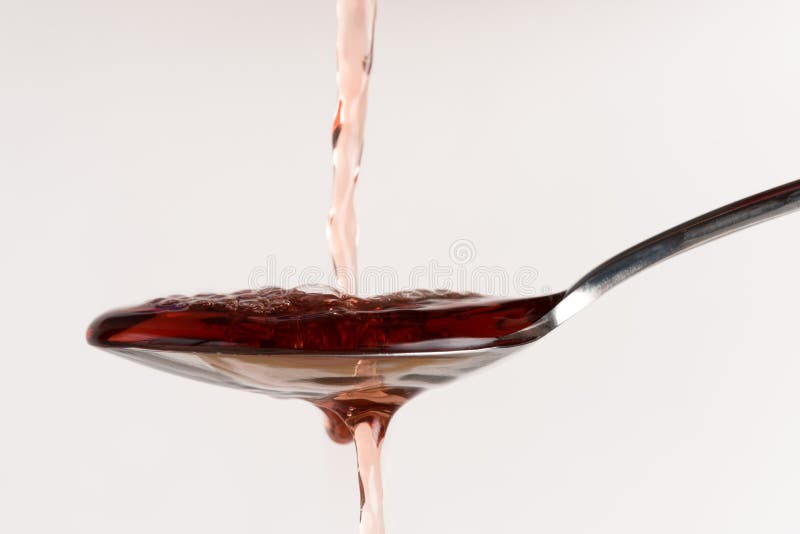 Pouring Red Wine Vinegar on a Spoon Stock Photo - Image of action ...