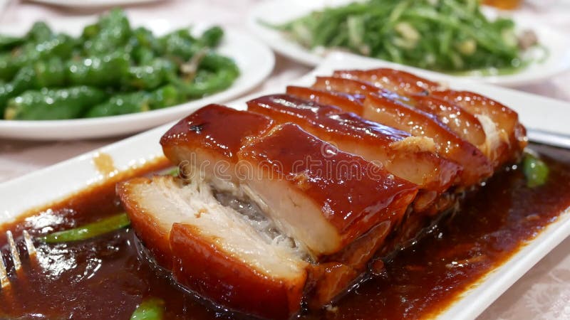 The Motion of Preserved Vegetables with Layer Pork on a Plate with ...