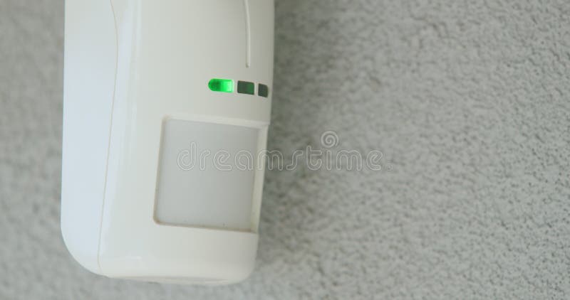 Motion Sensor on the Wall of the House. LED Indicators Light Up To ...