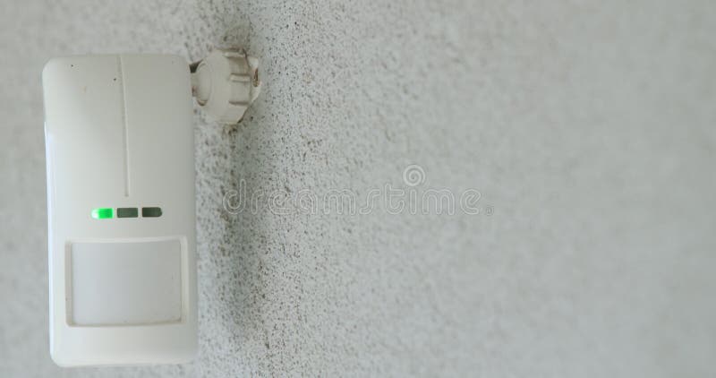 Motion Sensor on the Wall of the House. LED Indicators Light Up To ...