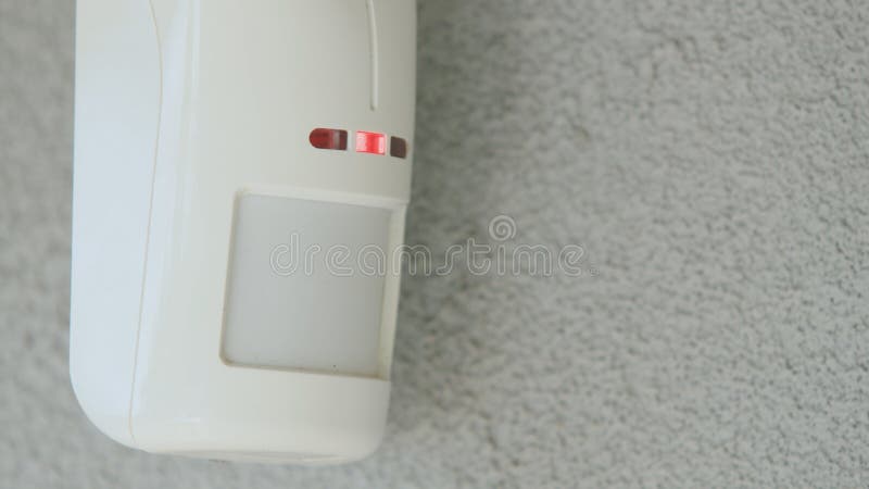 Motion Sensor on the Wall of the House. LED Indicators Light Up To ...