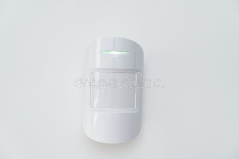 The Motion Sensor On The White Wall. Device That Tracks The Movement Of ...