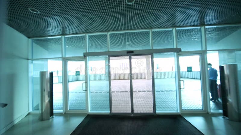 Motion through Sliding Glass Doors in Business Stock Video - Video of ...
