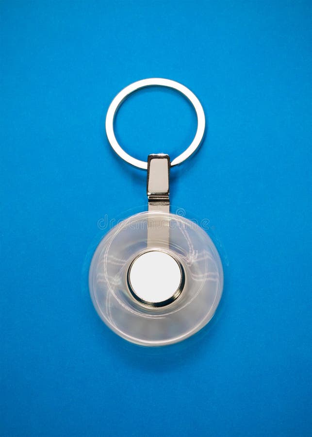 Motion of Spinning or Key Ring on Blue Paper Background. Blank Key ...