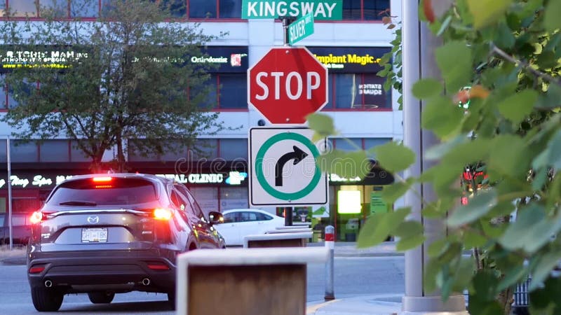 Stop Sign Half Buried in Snow As People Wait at Crowded Bus Station ...