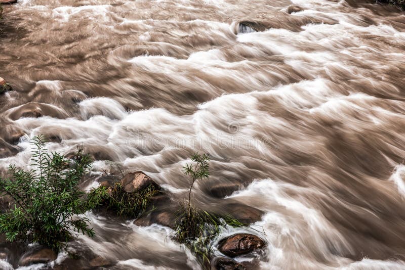 Motion stream of mud river stock photo. Image of river - 124000268
