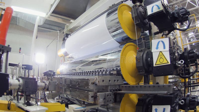 Motion To Machine Tool with Rollers Stretching Plastic Sheet Stock ...