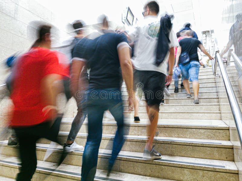 Motion View of People Climbing Indoor Stairs Stock Image - Image of ...
