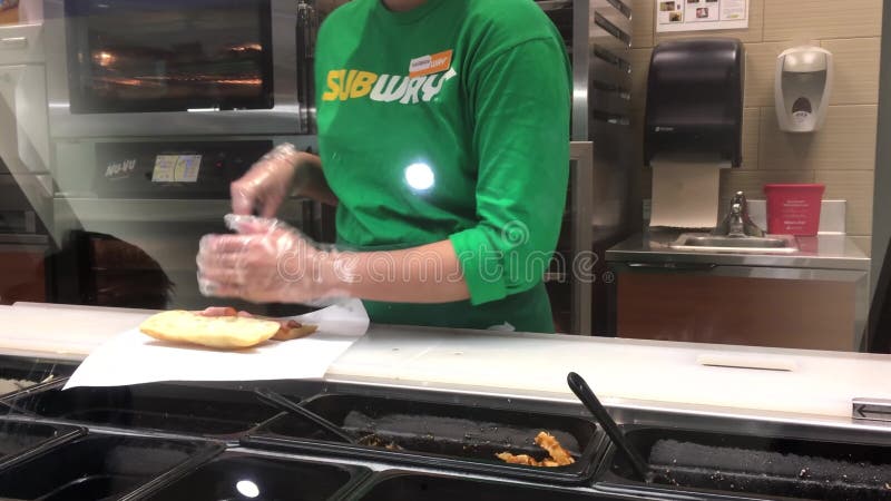 The Motion of Worker Preparing a Sandwich for the Customer Inside ...