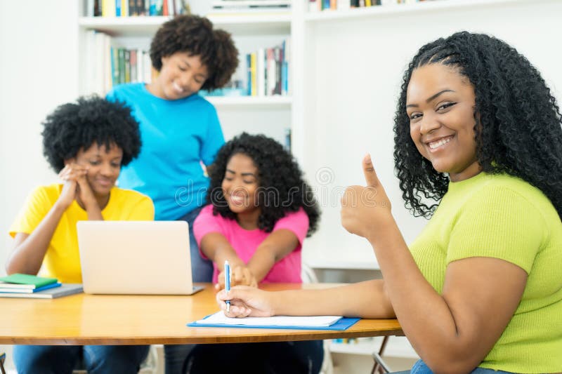Motivated African American Computer Science Student with Group of ...