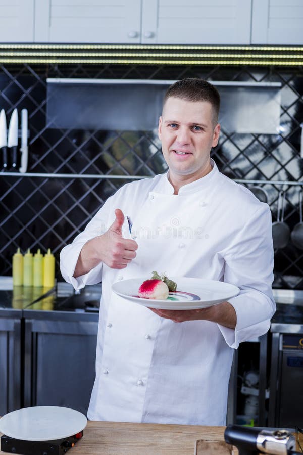 Motivated Cook Introducing His Dish To the Chef Stock Image - Image of ...