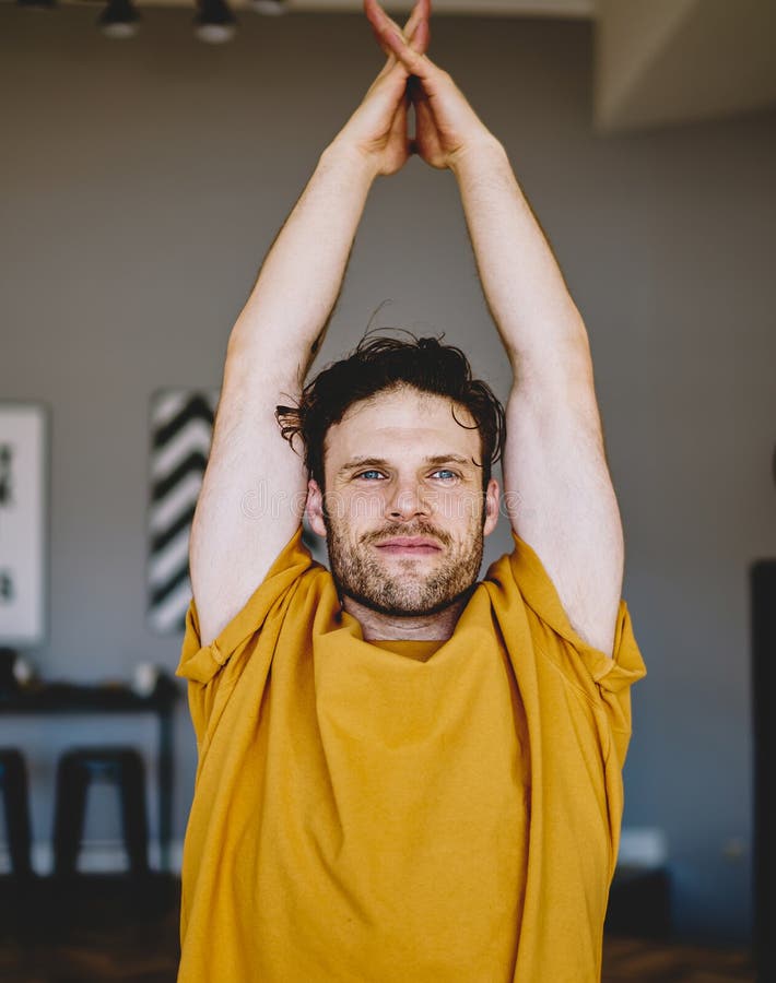 Motivated Hipster Guy Doing Yoga Exercises during Training Stock Image ...