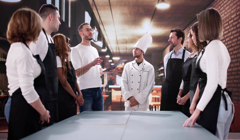 Motivated Restaurant Staff Collaborate with Diverse Team Stock Photo ...