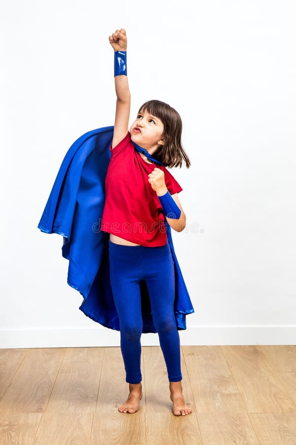 Motivated Super Hero Kid Showing Strength and Imagination, Reaching ... Motivated Super Hero Kid Showing Strength and Imagination, Reaching ...