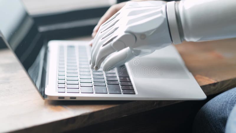 Motivated Woman Using Prosthetic Arm Working or Learning Notebook ...