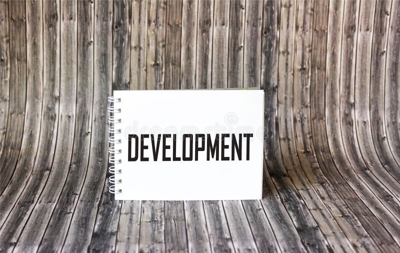 Word Development Written by a Hand Stock Photo - Image of technology ...