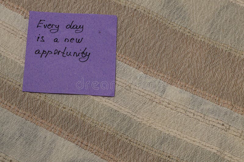 Daily Motivational Note on a Textured Fabric Surface with Inspiring ...