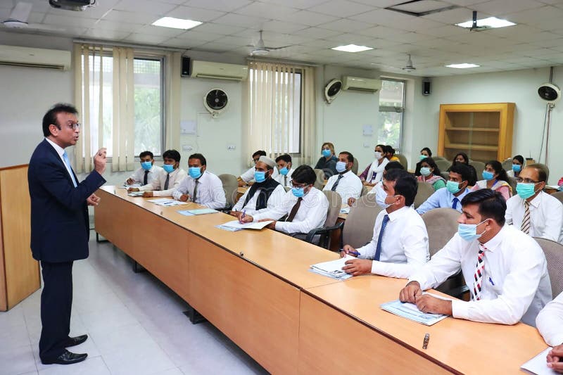 Motivational Speaker Giving Lecture and Coaching Young People ...