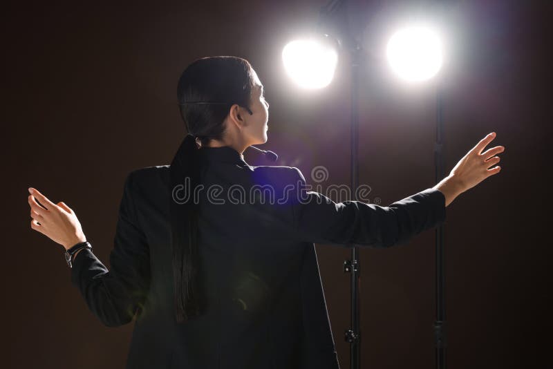 Motivational Speaker with Headset Performing on Stage, Back View Stock ...