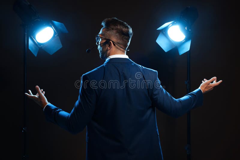 Motivational Speaker with Headset Performing on Stage, Back View Stock ...