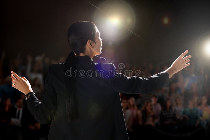 Motivational Speaker with Headset Performing on Stage, Back View Stock ...