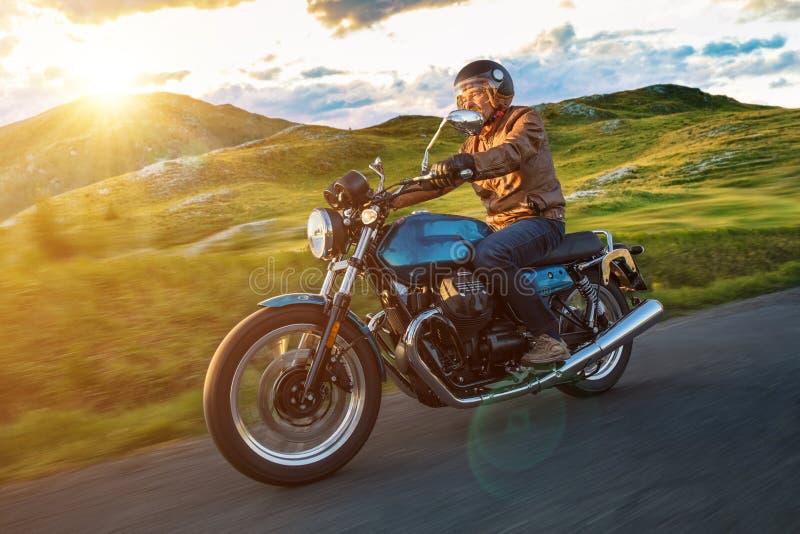 Moto Racer Riding on Forest Road during Sunset Stock Photo - Image of ...