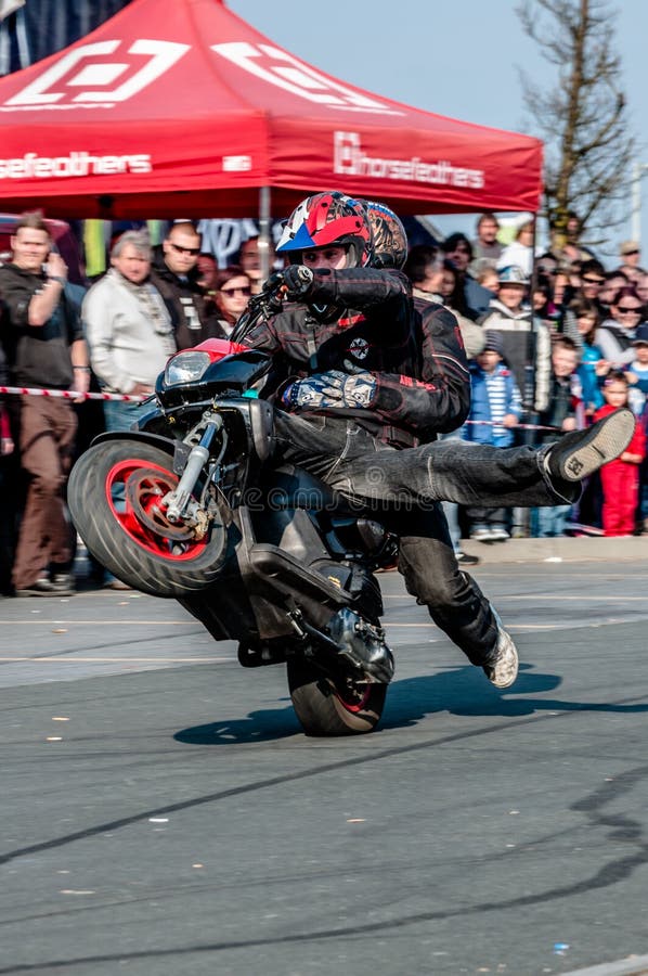 Moto stunt-riding editorial stock image. Image of internal - 24599614