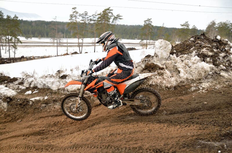 Motocross Racer Rides in Descent on the Rear Wheel Stock Image - Image ...
