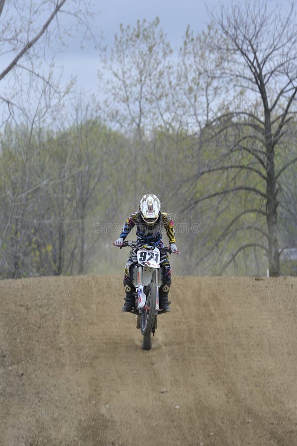 Motocross Racer Riding Down a Dirt Hill Editorial Photo - Image of bike ...