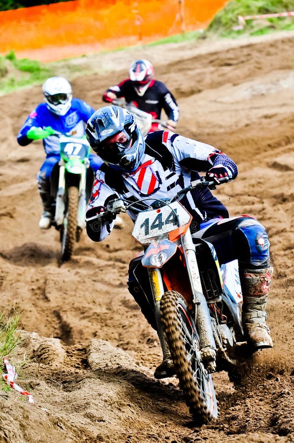 Motocross Riders Lined Up before Start Stock Photo - Image of sports ...