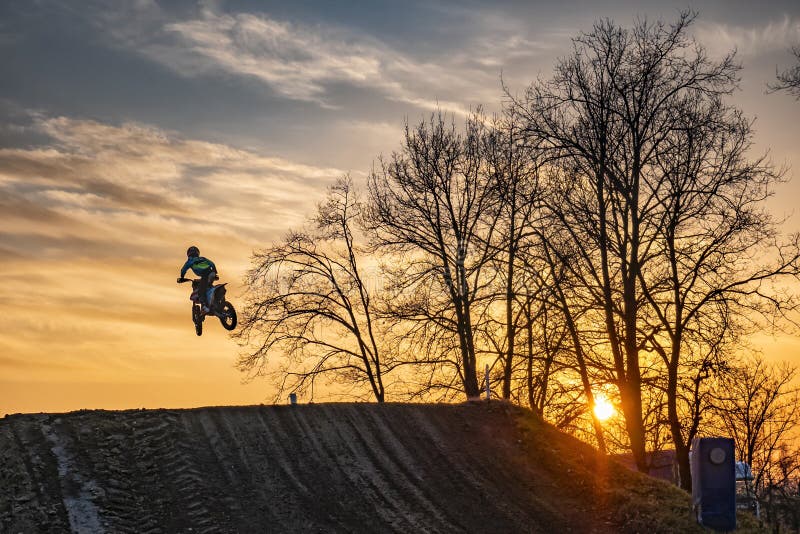 Motocross Scene in Sunset Hours Stock Image - Image of dust, cross ...