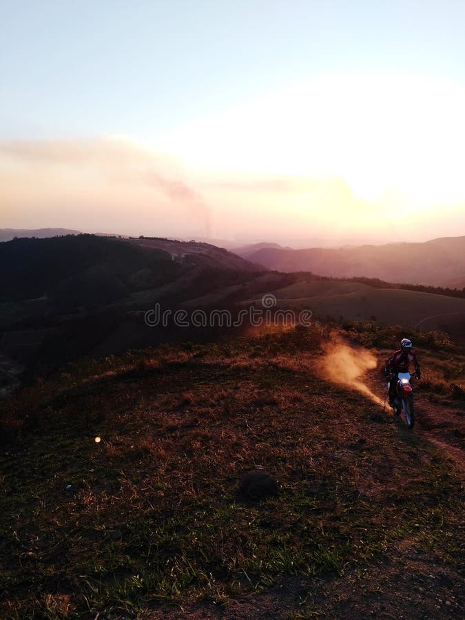 Motocross on a Sunset Mountain Day Stock Photo - Image of motocrossing ...
